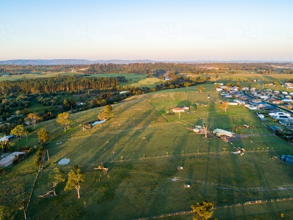 Image of Aerial view of small acreage properties backing onto farmland ...
