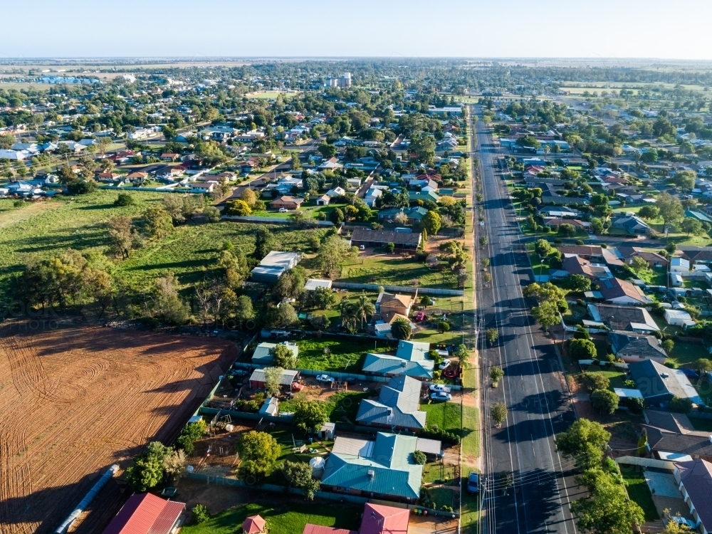Image of Aerial view of small aussie town with houses backing onto ...