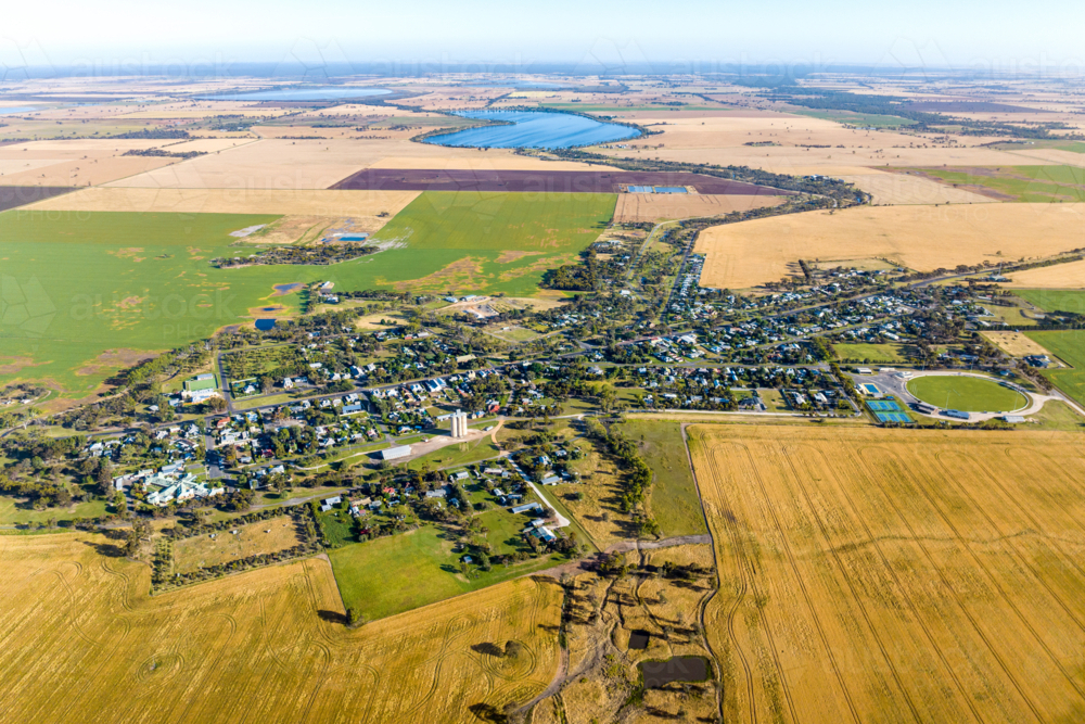 Image of Aerial view of small rural town surrounded by farmland ...