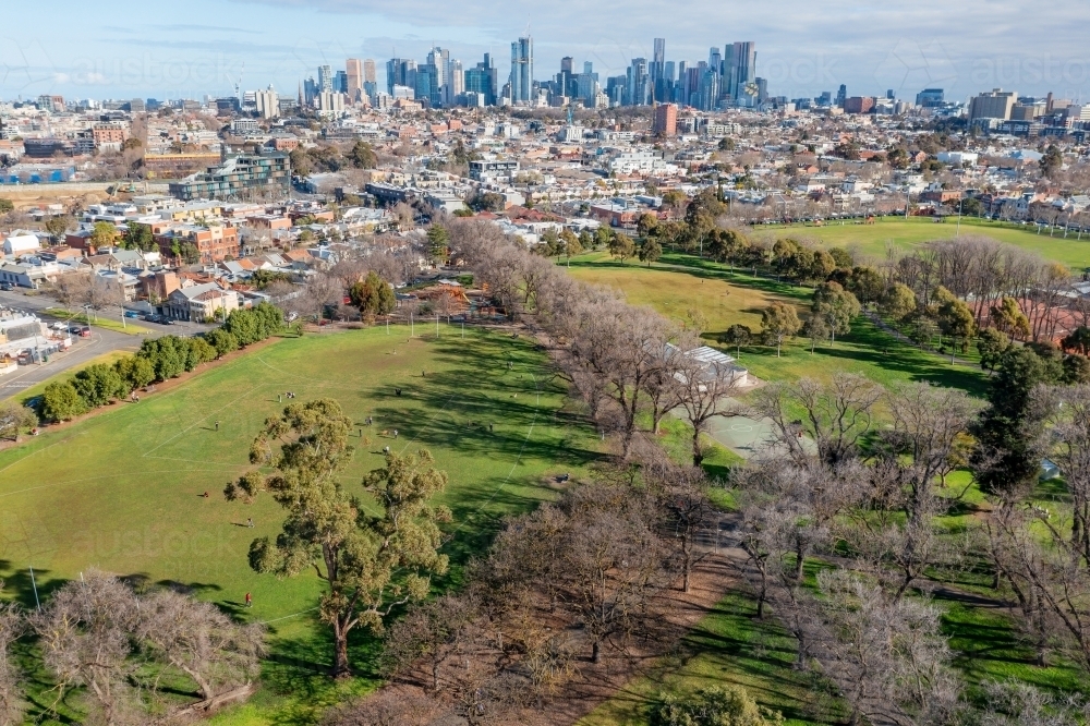 Image of Aerial view of sports ovals in a suburban park with city ...