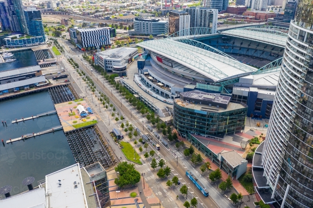 Image of Aerial view of sports stadium along side a city esplanade and ...