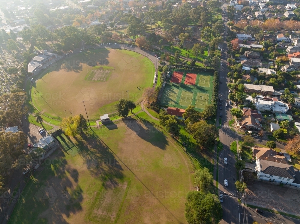 Image of Aerial view of suburban sports ovals and tennis courts ...