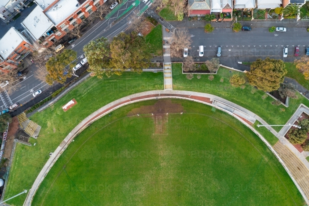 Image of Aerial view of suburban streets surrounding a football oval ...