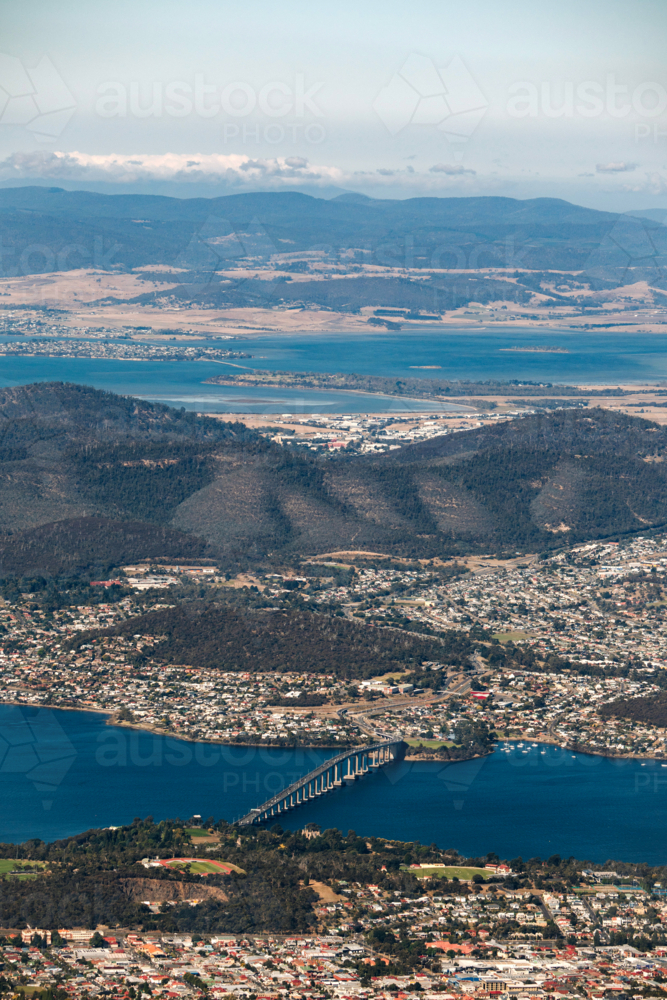 Image of Aerial view of the city connected by Tasman bridge - Austockphoto
