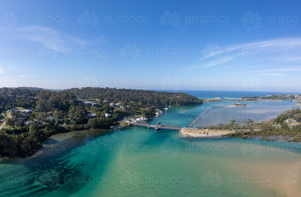 Image of Aerial view of the idyllic coastal town of Narooma at sunset ...