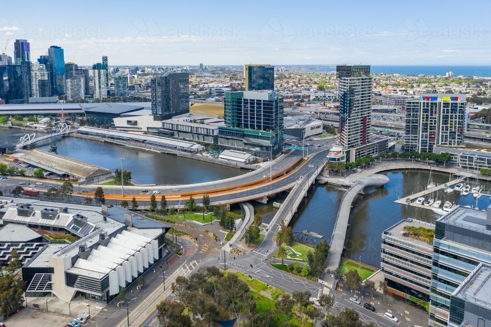 Image of Aerial view of urbanized city with trees, bridges, roads ...