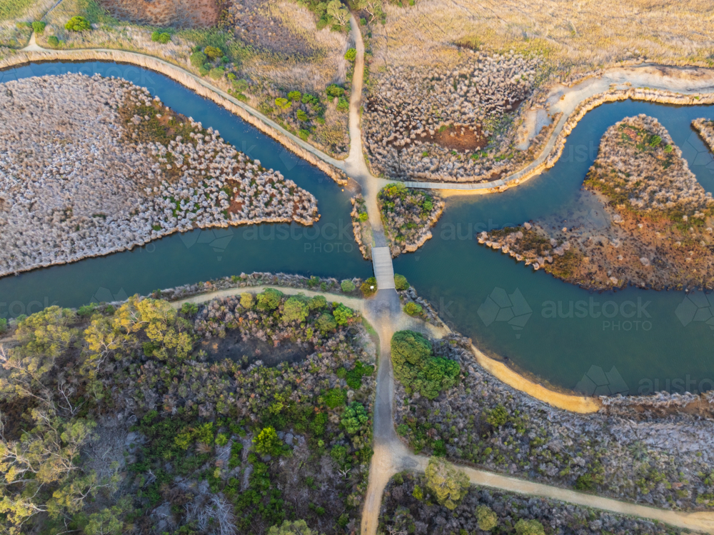 Image of Aerial view of walking tracks and bridges linking islands in a ...