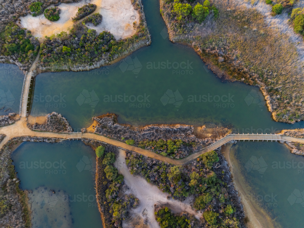 Image of Aerial view of walking tracks and bridges linking islands in a ...