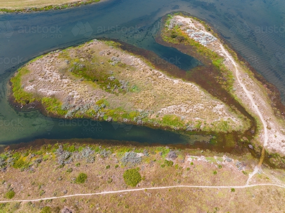 Image of Aerial view of walking tracks around islands in a coastal ...