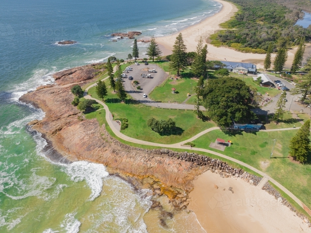 Image of Aerial view of walking tracks on a coastal park above a rocky ...