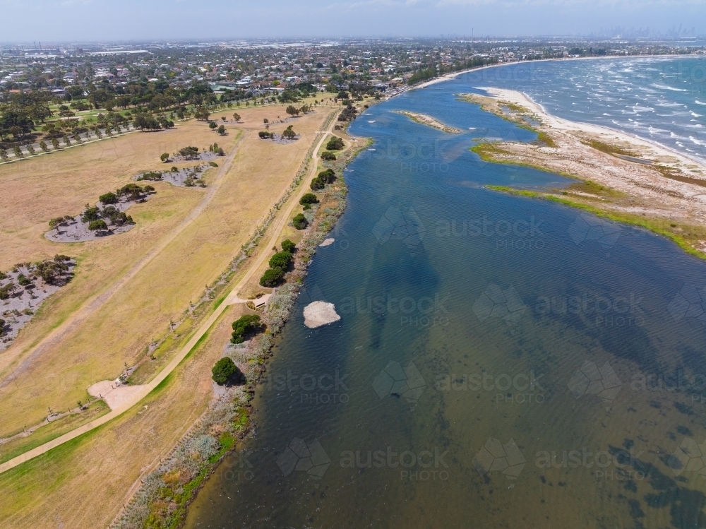 Image of Aerial view of walking tracks through dry parkland on the edge ...