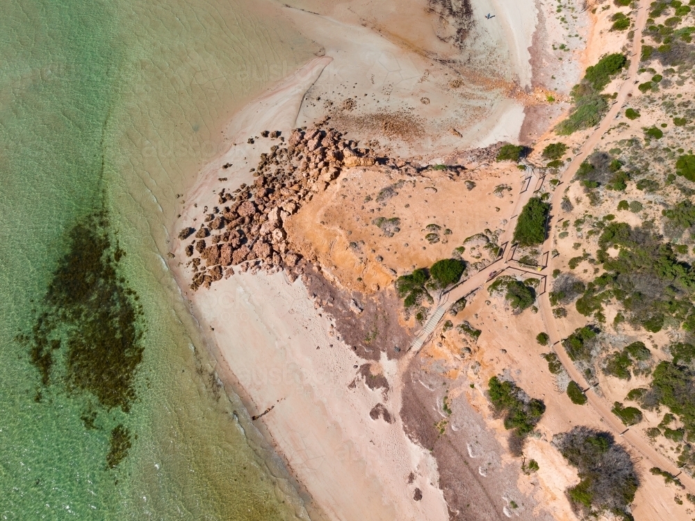 Image of Aerial view of walking trails on top of a rocky coastal ...