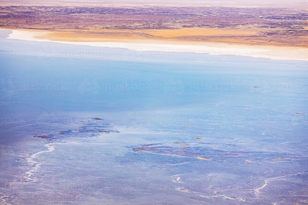 Image of aerial view of water in Lake Eyre - Kati Thanda - Austockphoto