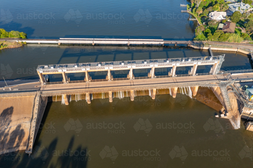 Image of Aerial view of weir on an inland lake - Austockphoto
