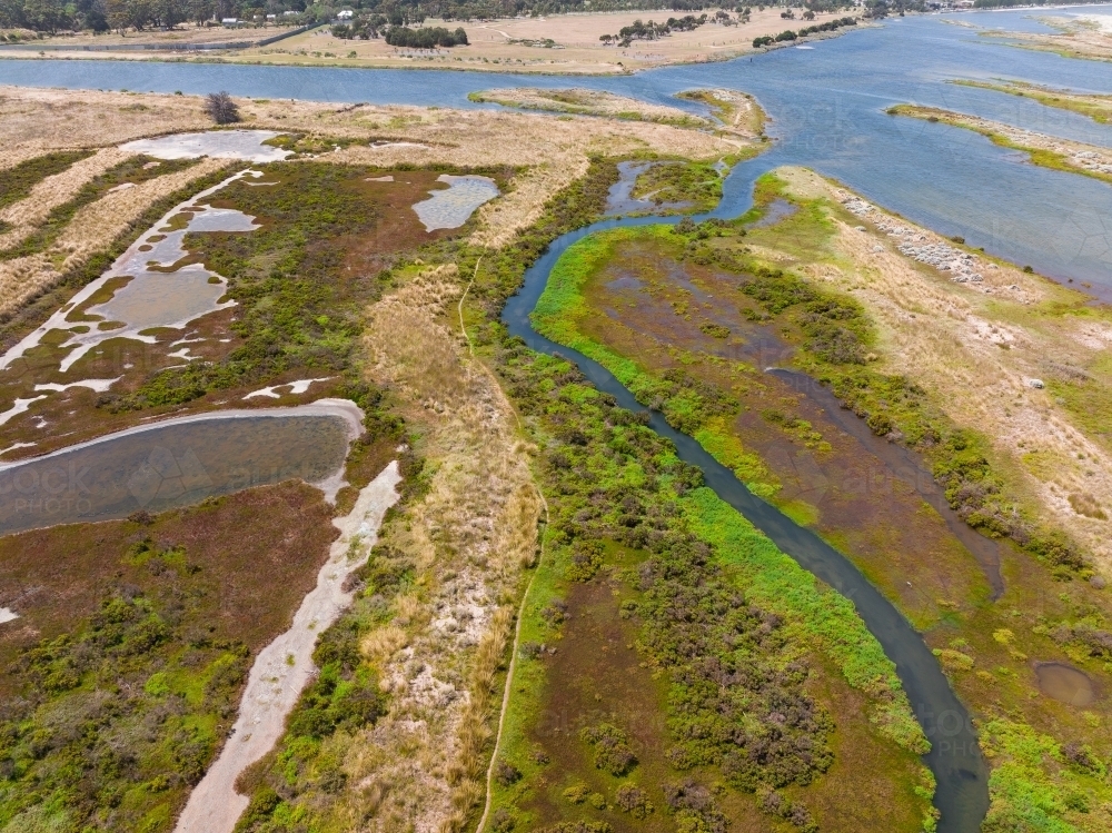 Image of Aerial view of wetlands with colourful vegetation and creeks ...