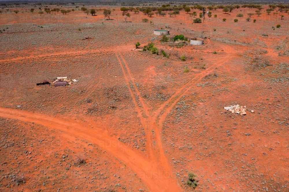 Image of Aerial view of wheel tracks in red dirt in an outback ...