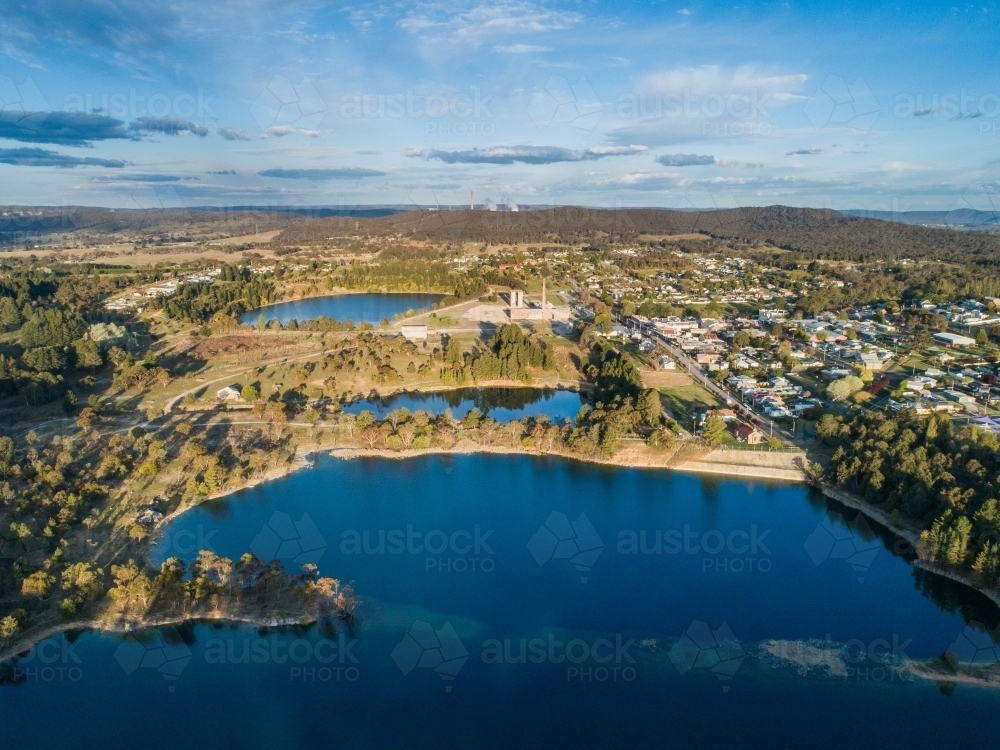Image of Aerial view over old quarry now a lake and Portland Cement ...