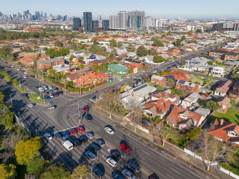 Image of Aerial view traffic at a busy intersection amongst inner city ...