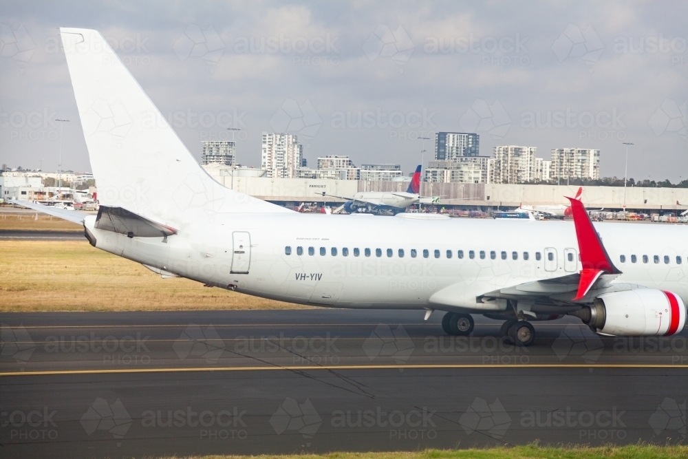 Image of Aeroplane on runway at air port Sydney - Austockphoto