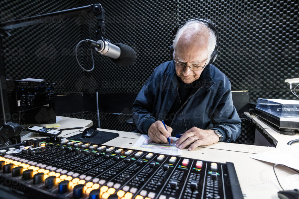 Image of An elderly caucasian man DJs and presents his music show on ...