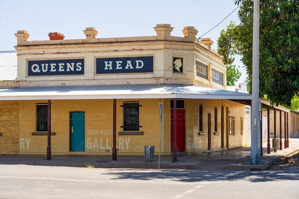 Image of An historic corner hotel building with surrounding veranda in ...