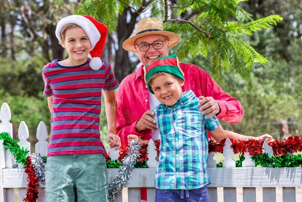 Image of Aussie grandfather with two of his grandsons at Christmas ...