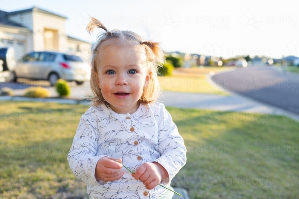 Image of Aussie kid portrait in suburban neighbourhood with copy space ...