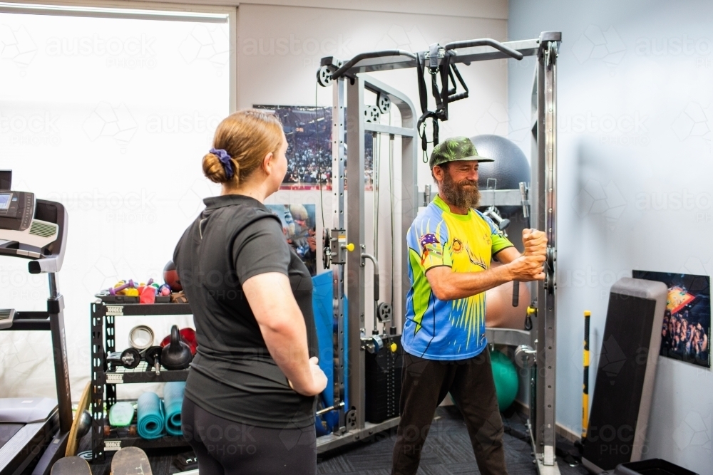 Image of Australian aboriginal man doing physiotherapy with physio ...