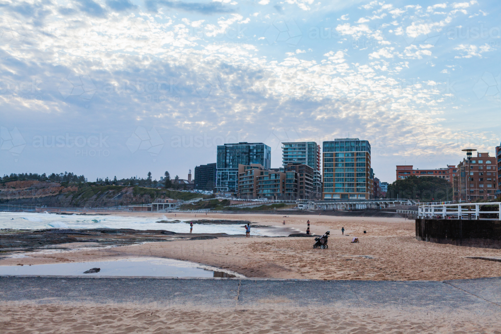 Image of Australian beach scene with distant people on the seashore and ...