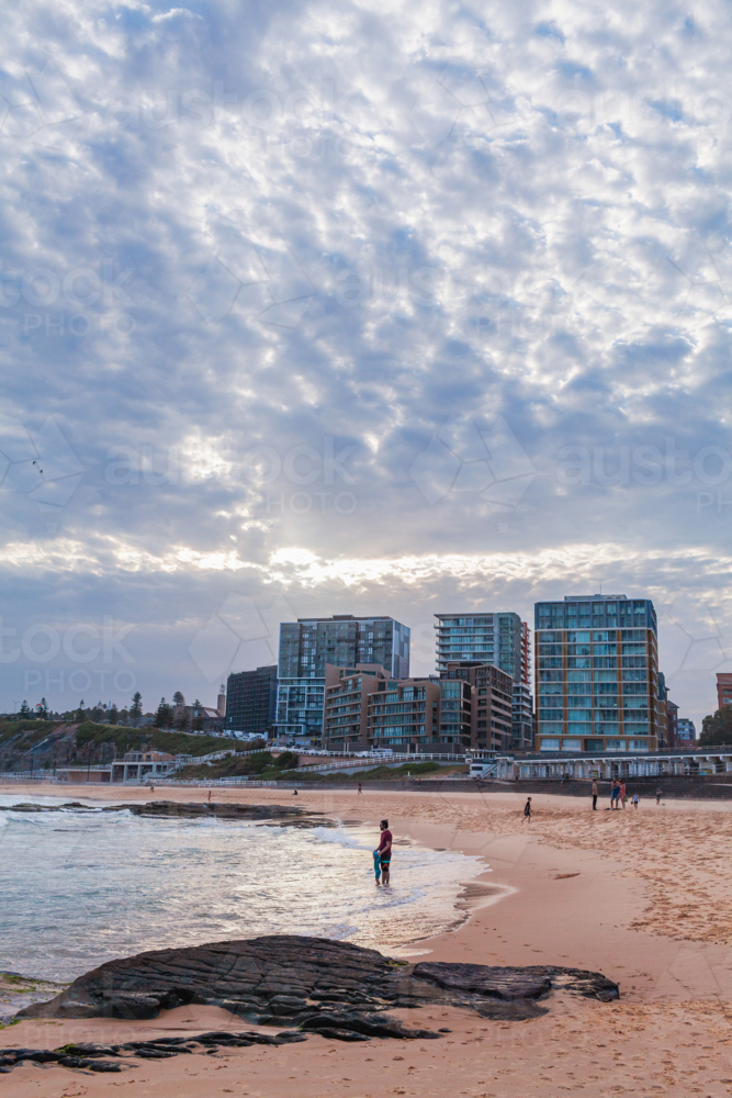Image of Australian beach scene with people on the seashore and city ...