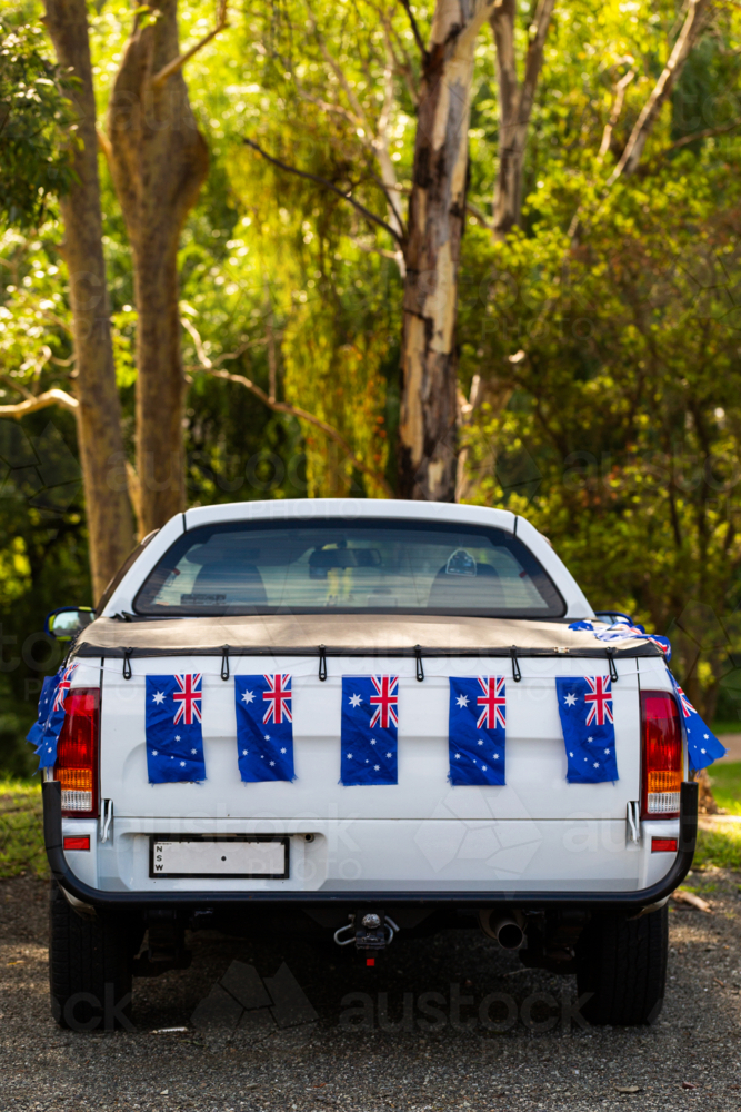 Image of Australian flag bunting on ute for Australia Day - Austockphoto