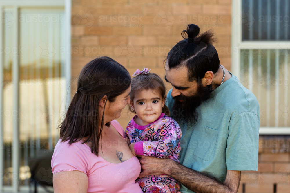 Image of Australian parents with First Nations Australian toddler girl ...