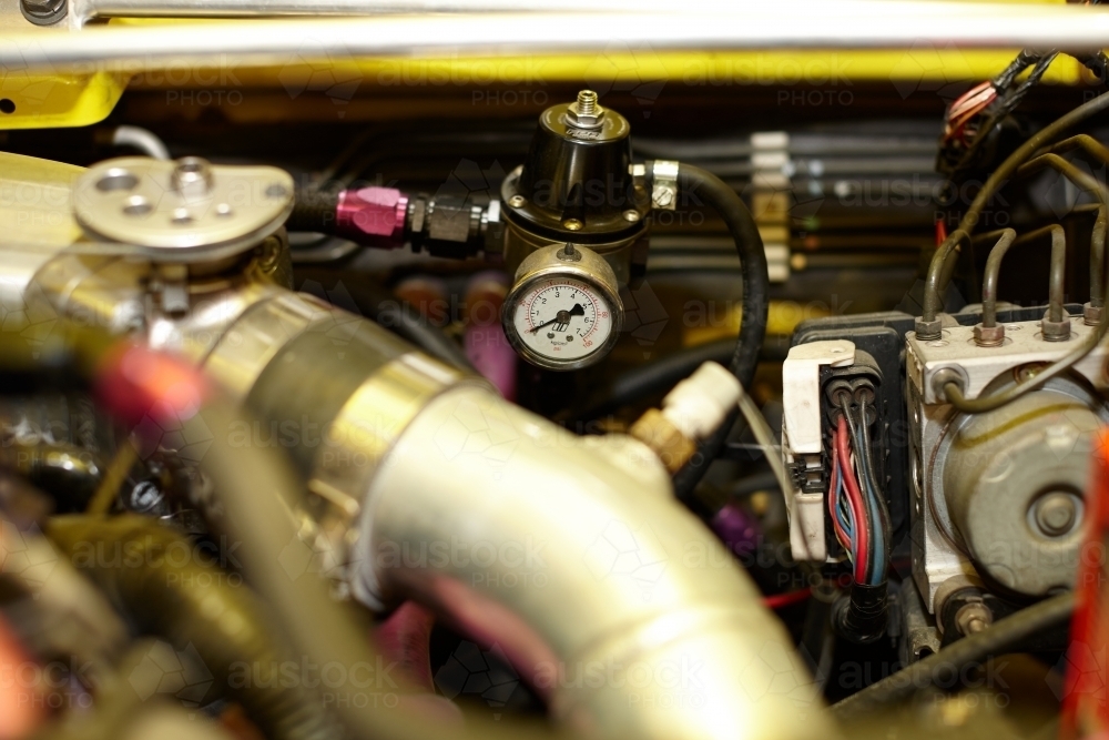 Image of Automotive work on engine of vehicle - Austockphoto