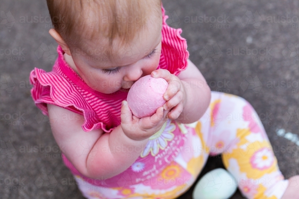 Image of Baby hand holding chalk to draw with - Austockphoto