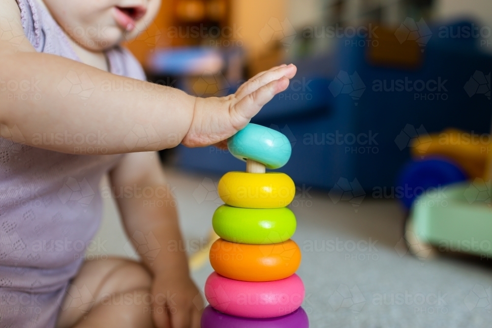Image of Baby learning through play developing fine motor skills with ...