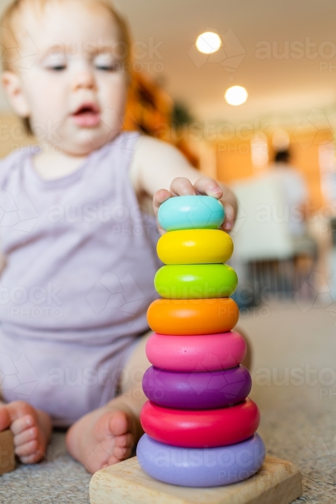 Image of Baby learning through play developing fine motor skills with ...