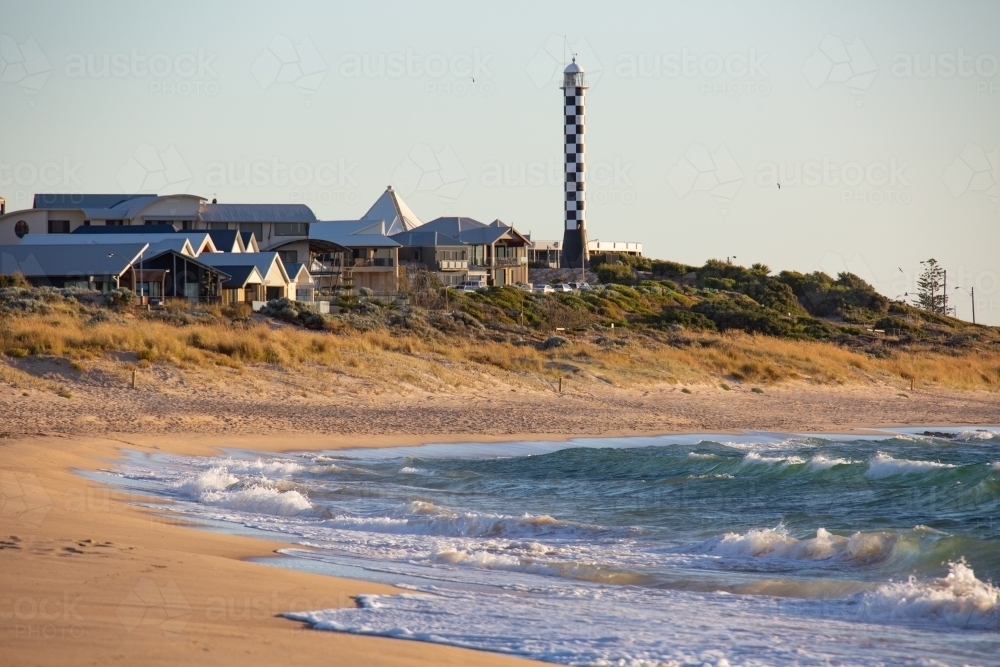 Image of beach at Bunbury looking towards lighthouse - Austockphoto