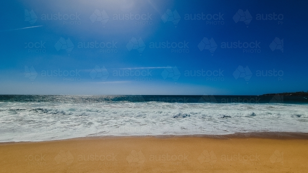 Image of Beach landscape scene on bright sunny day - Austockphoto