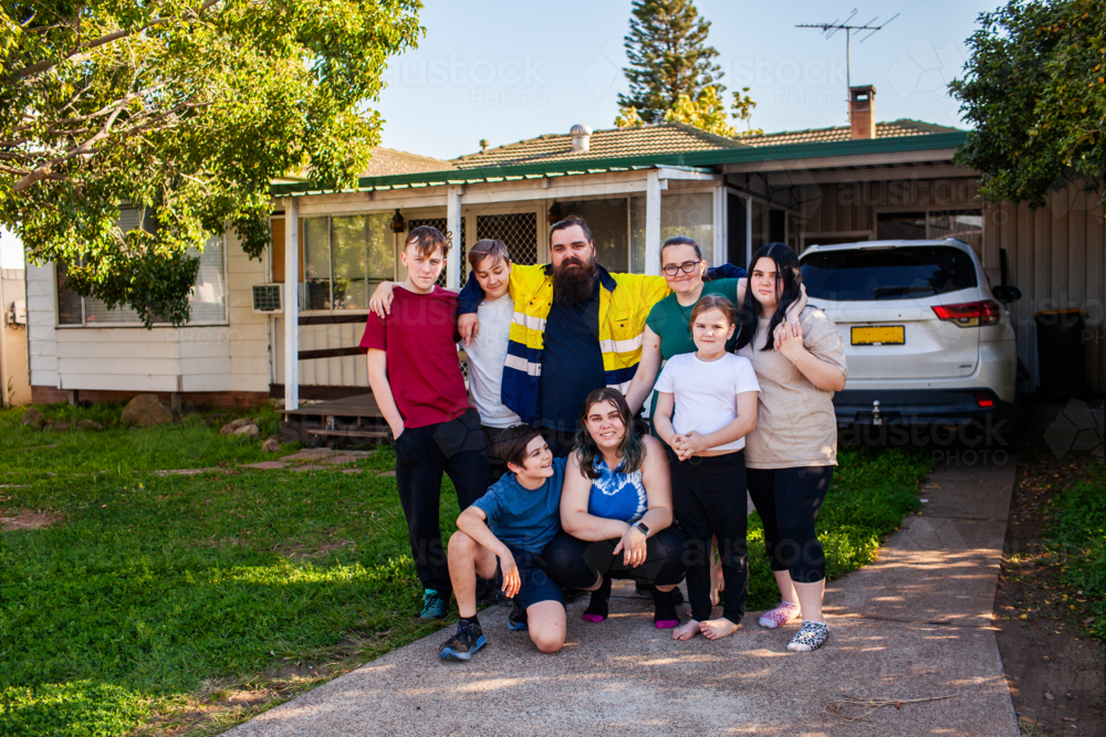 Image of Big Aussie family with teen kids smiling together in front ...