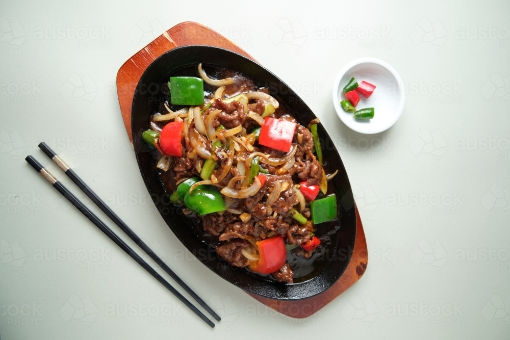 Image of Black pepper sizzling beef - Austockphoto