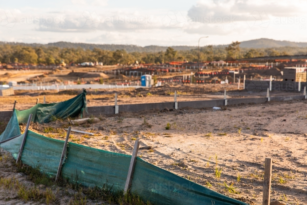 Image of blocks of cleared land ready as part of a new housing estate ...