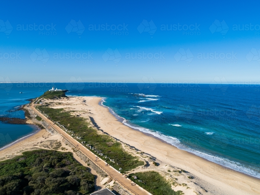 Image of Blue ocean water and sunlit beach in Newcastle NSW seen from ...