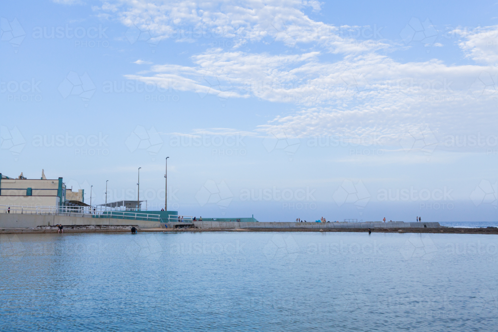 Image of Blue rippling water of Newcastle Canoe Pool with big sky and ...