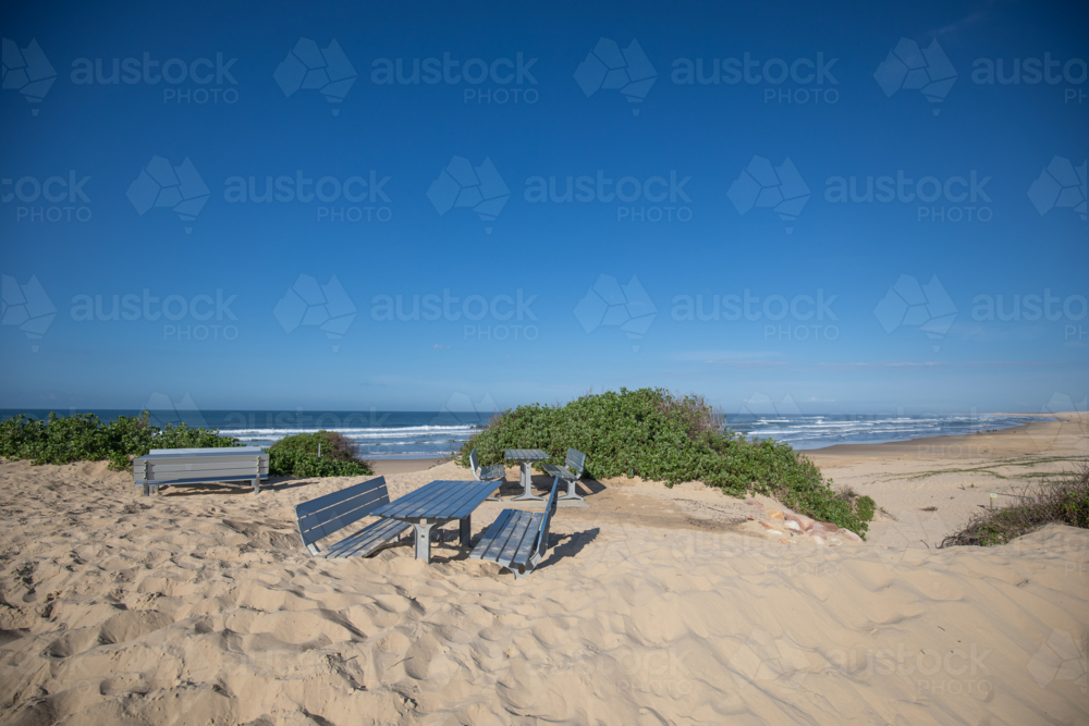 Image of Blue skies over Birubi Beach after storms causing tables and ...