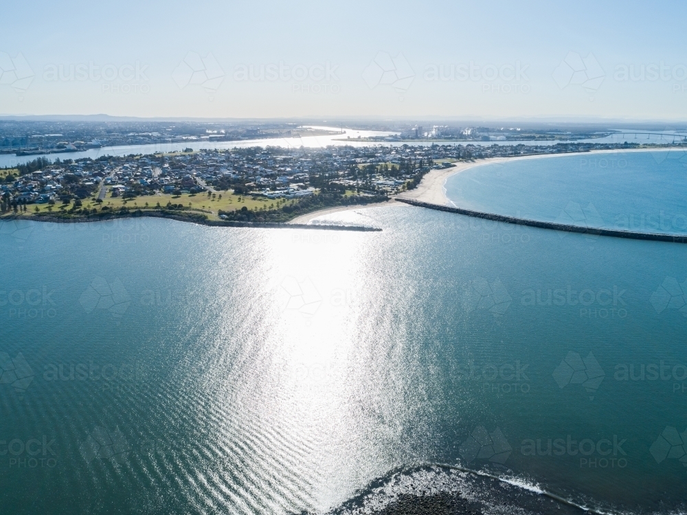 Image of Blue sunlit water where the Hunter River meets the sea in the ...