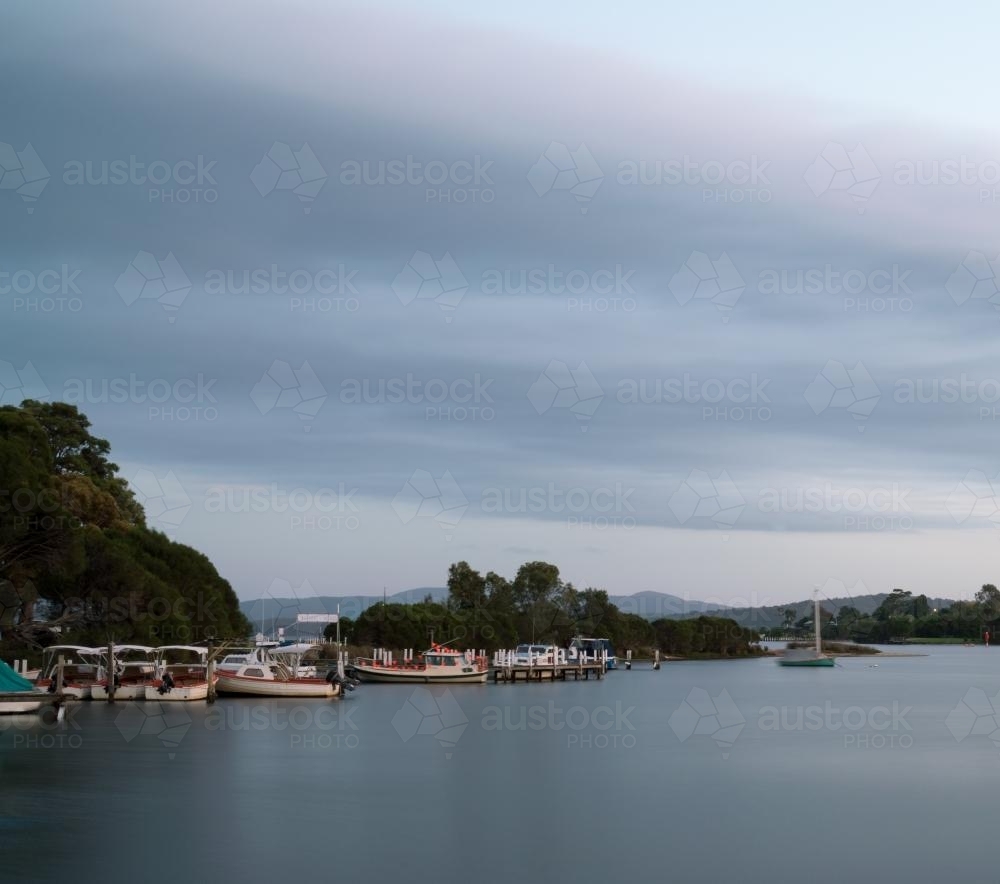 Image of Boats moored at Mallacoota Inlet - Austockphoto