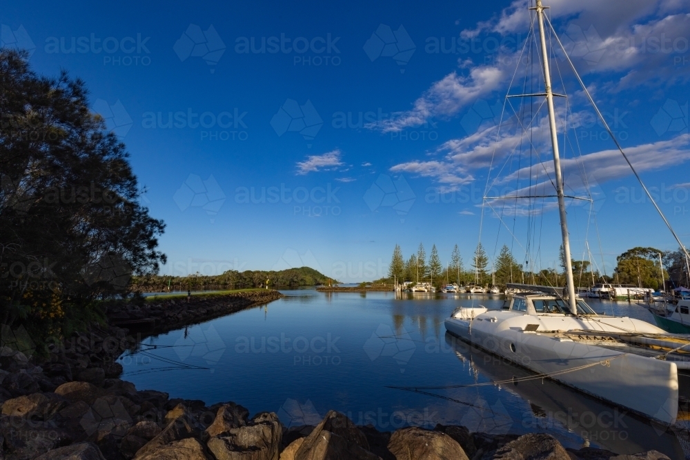 Image of Boats moored at the Brunswick Heads marina - Austockphoto
