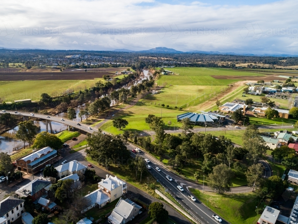 Image of Bridge over Hunter river playing field and library building ...