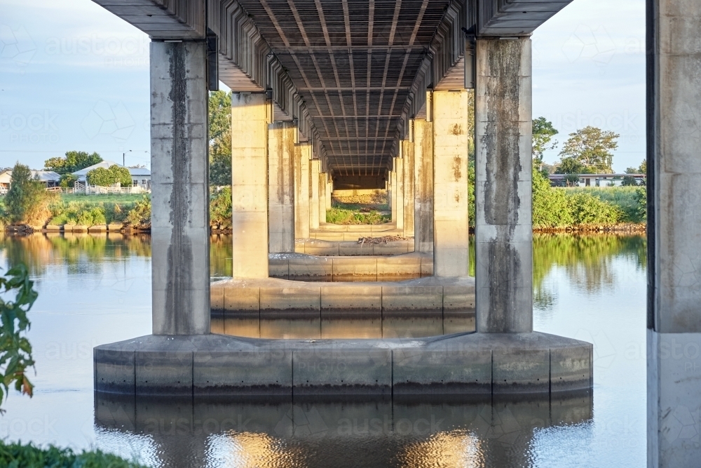 Image of Bridge over river on dusk - Austockphoto