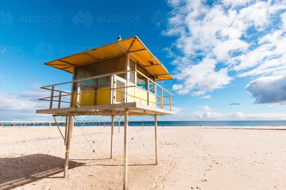 Image of Bright yellow lifeguard tower standing tall on Glenelg Beach ...